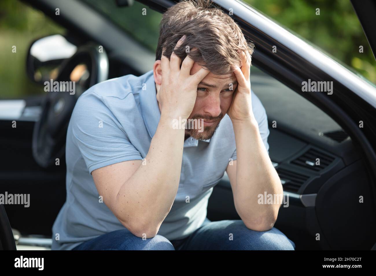 Sad man in trouble car hi-res stock photography and images - Alamy