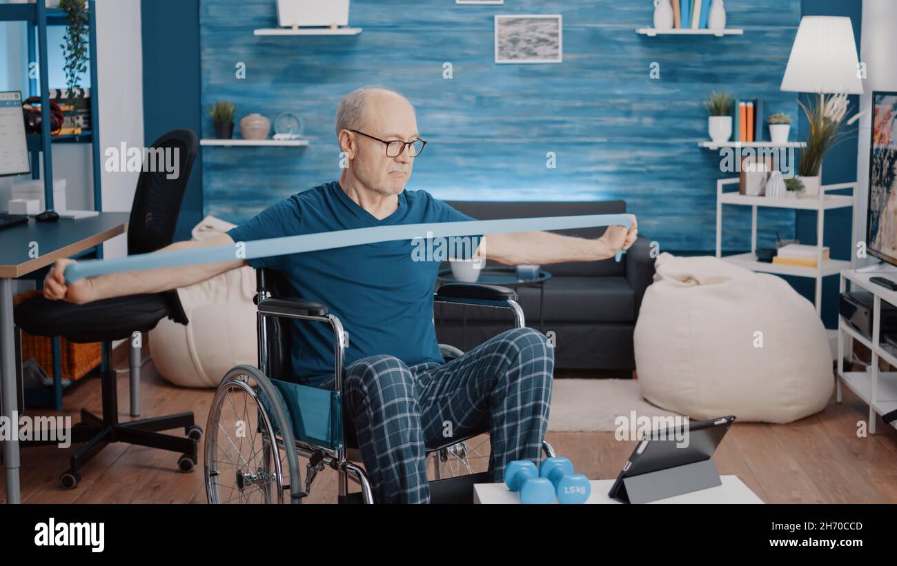 Old person disability pulling resistance hi-res stock photography and ...