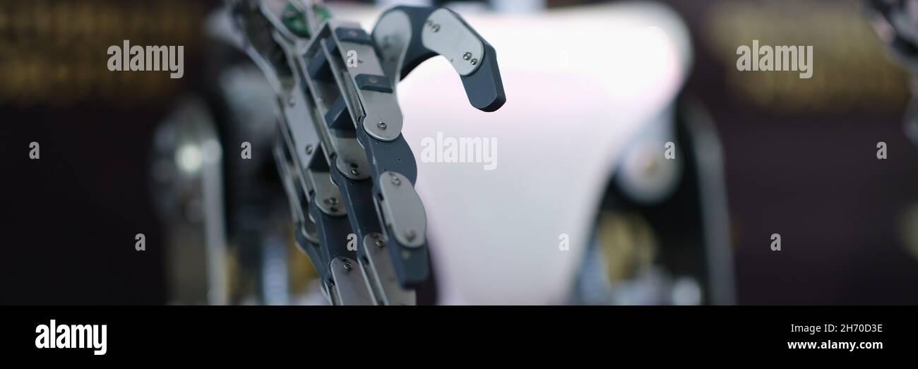 Robot stretching out metal hand for handshake closeup Stock Photo - Alamy