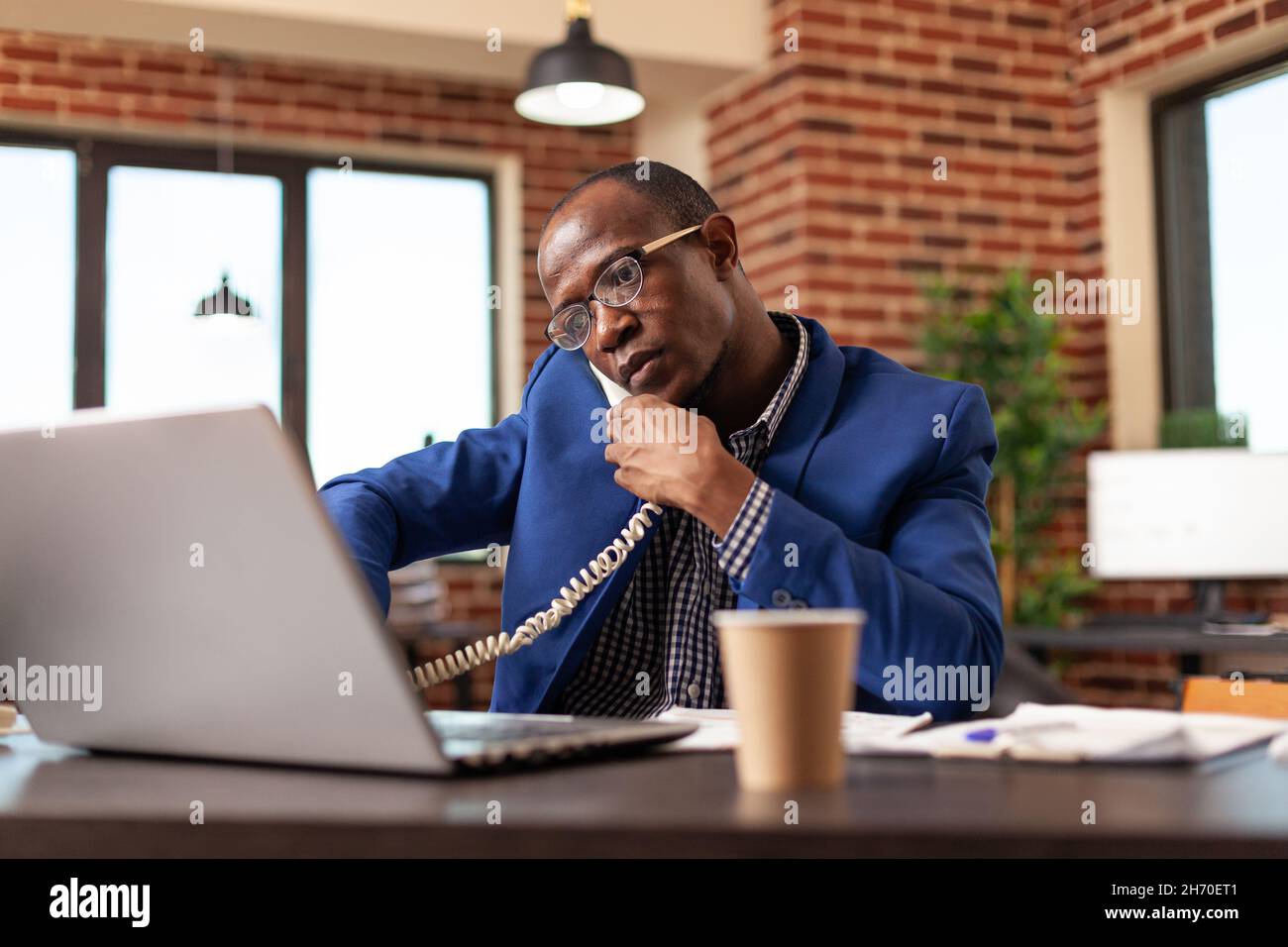 Man landline phone hi-res stock photography and images - Alamy