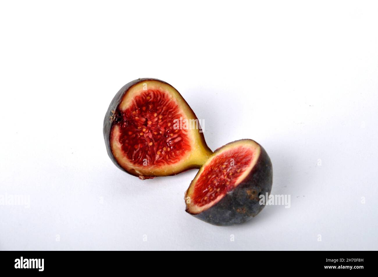 Spanish figs on a white background Stock Photo - Alamy