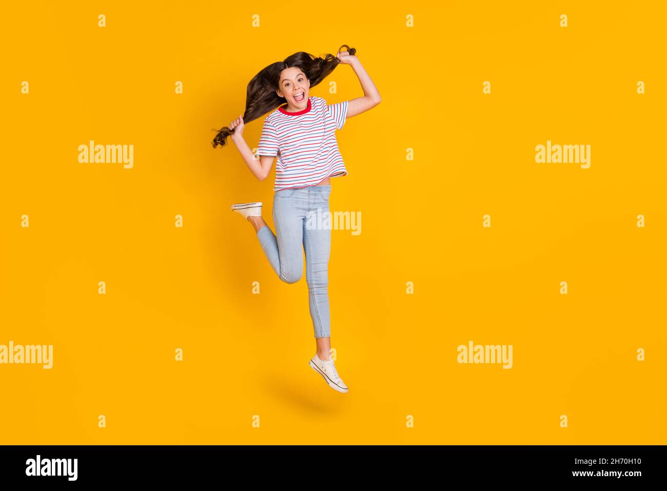 Full body photo of young excited girl happy positive smile crazy jump ...
