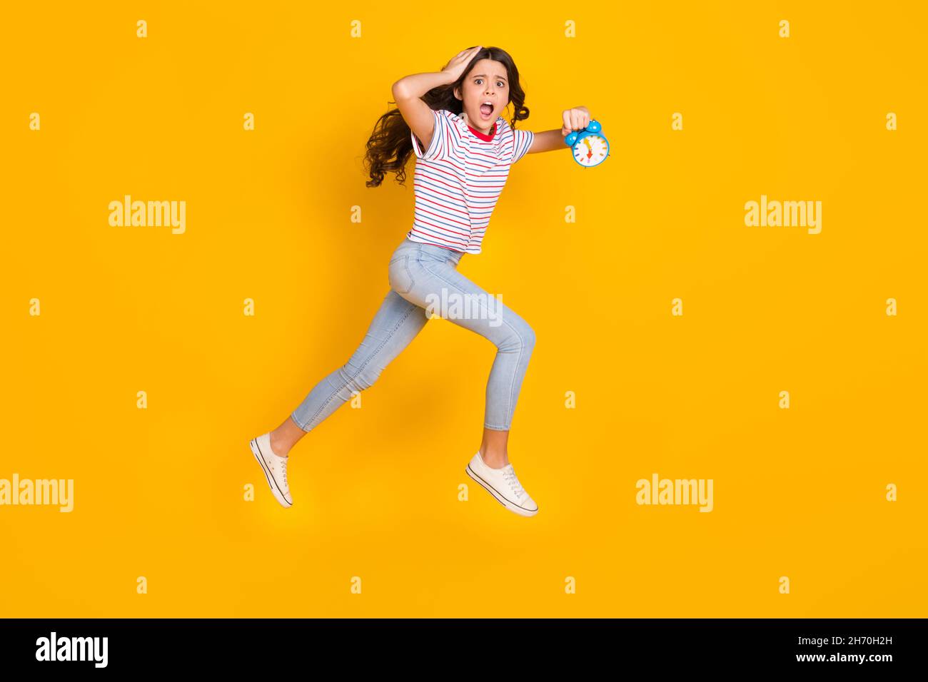 Full body profile side of young girl amazed shocked go walk run jump ...