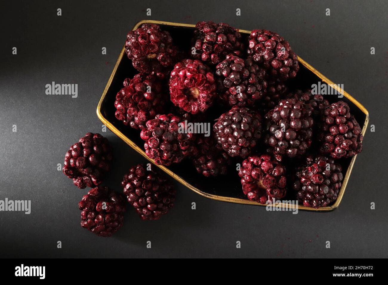 freeze dried whole blackberry fruit Stock Photo - Alamy
