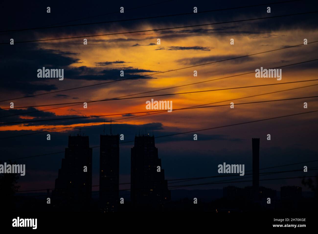 Sunset sky over the city buildings Stock Photo - Alamy