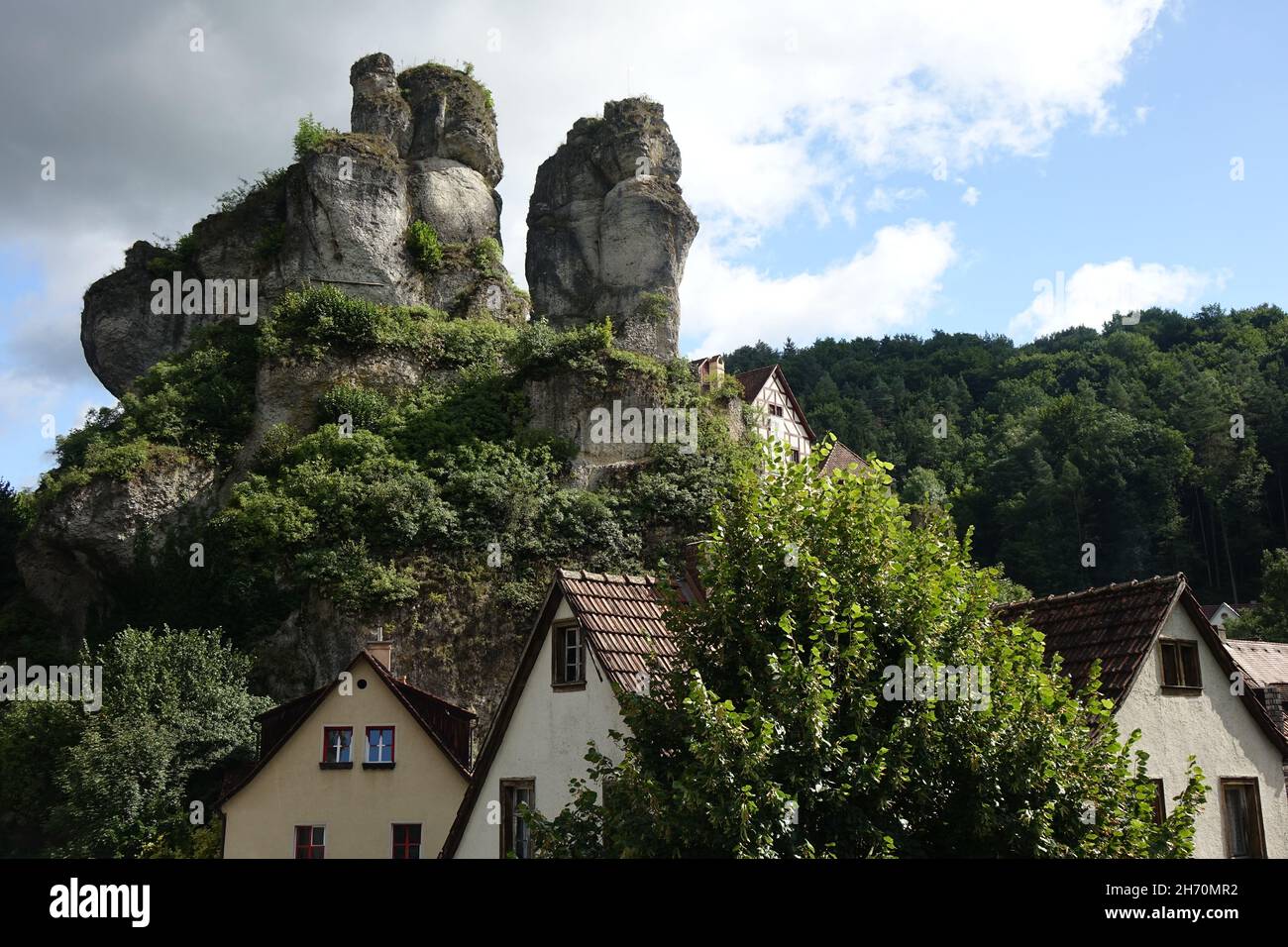 Famous rocks with lookout point Fahnenstein over traditional German ...