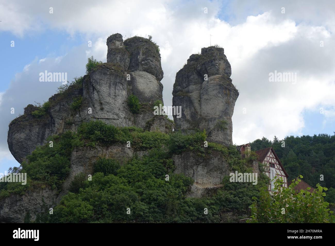 Famous rocks with lookout point Fahnenstein over traditional German ...