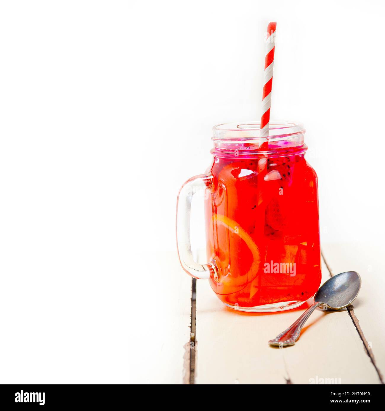 fresh fruit punch refreshing summer drink over white rustic wood table ...