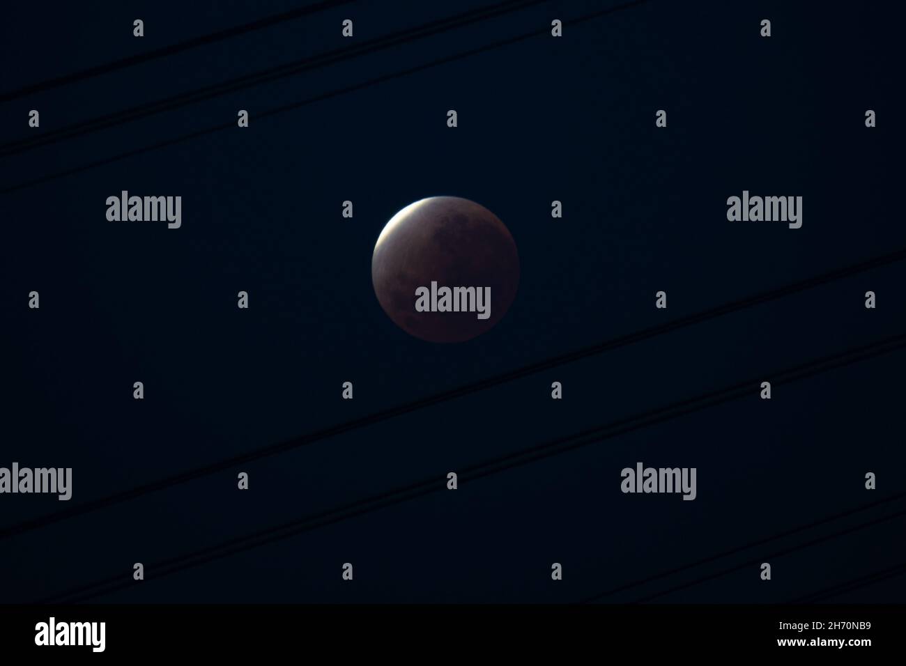 Santiago, Metropolitana, Chile. 19th Nov, 2021. The lunar eclipse from ...