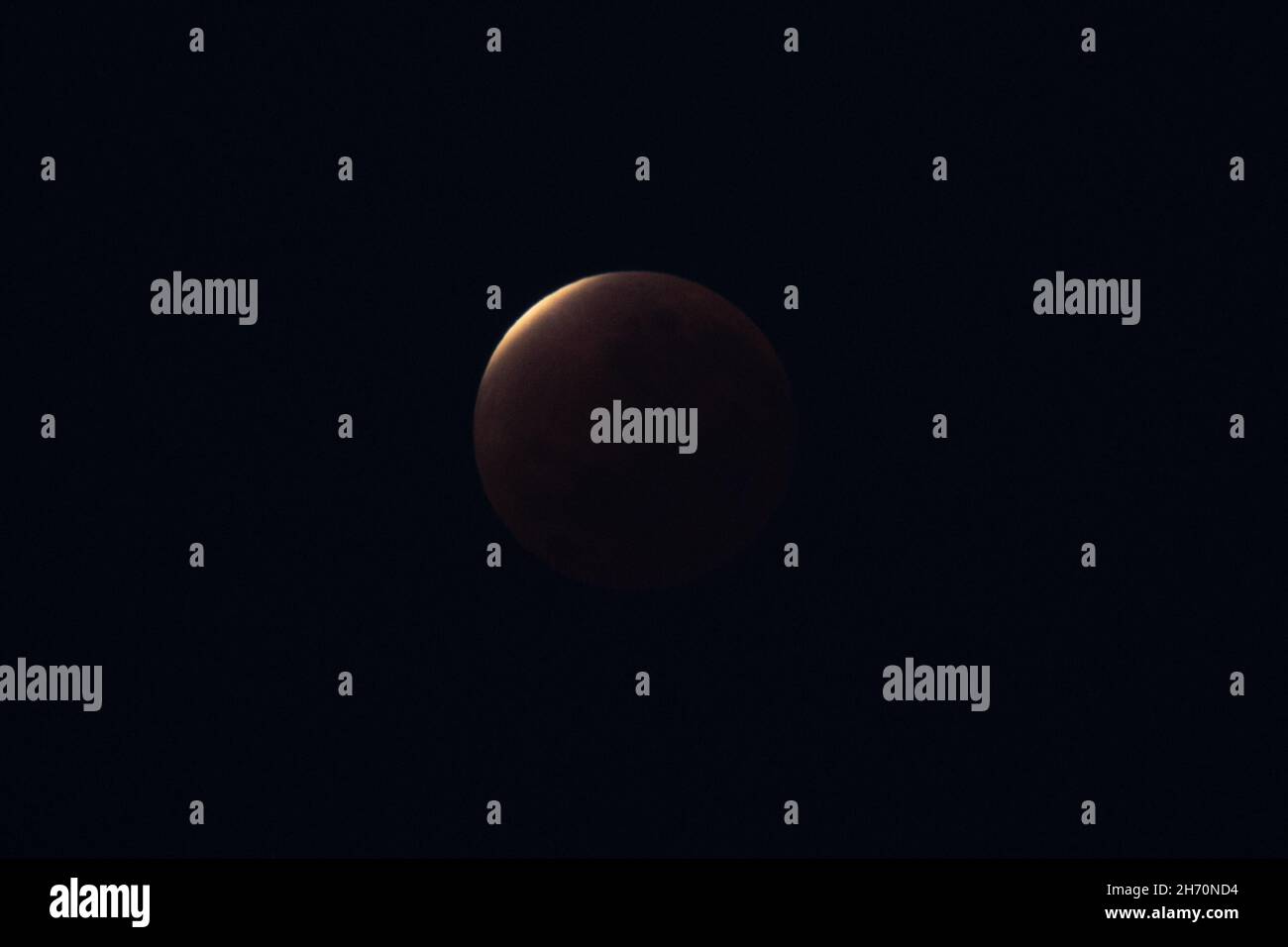 Santiago, Metropolitana, Chile. 19th Nov, 2021. The lunar eclipse from ...