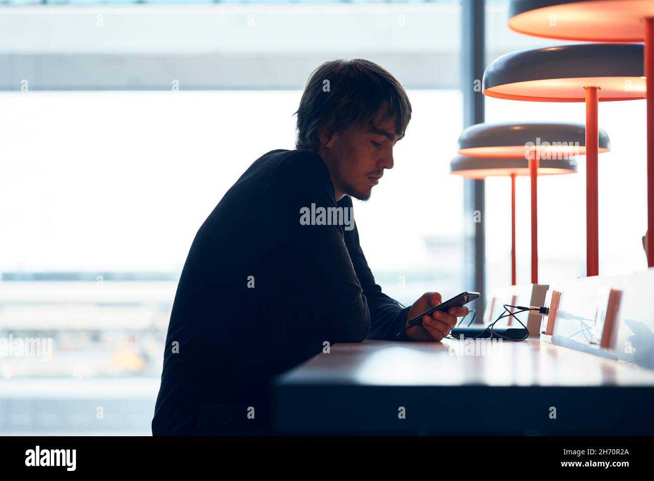 Back view of man phone hi-res stock photography and images - Alamy