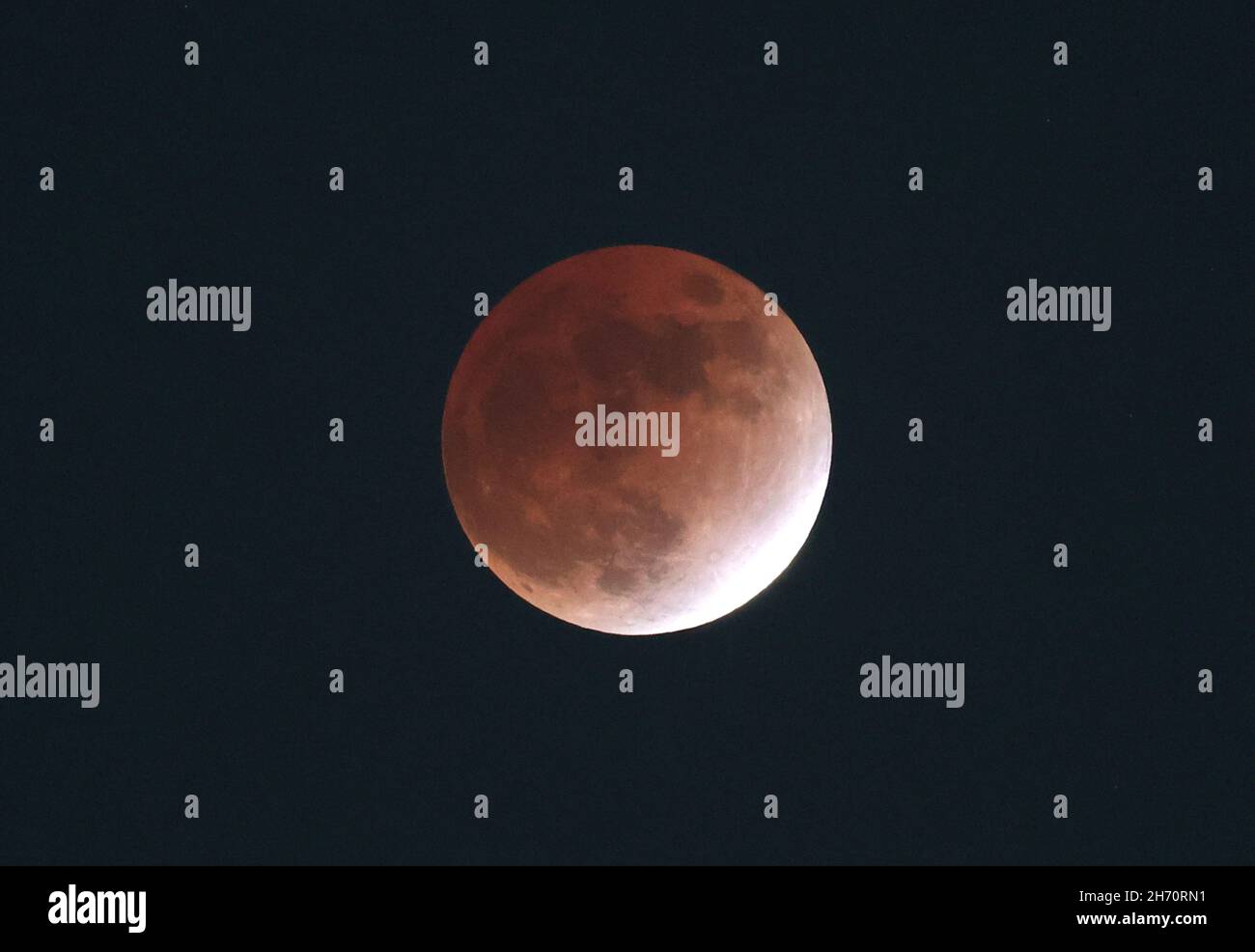 Tokyo, Japan. 19th Nov, 2021. An almost total lunar eclipse is observed ...