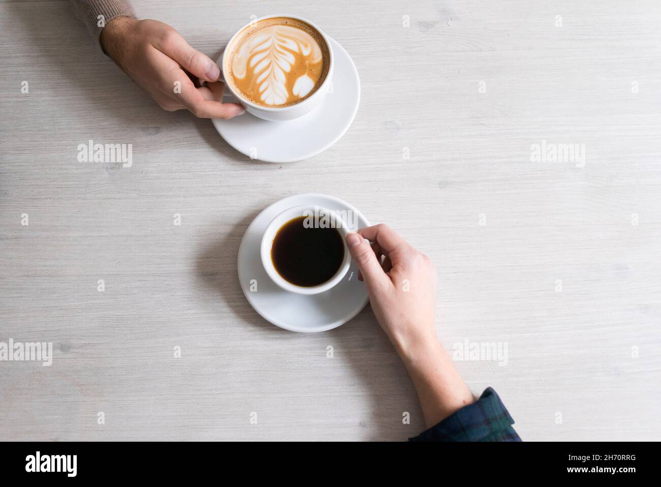 Hands holding coffee cups Stock Photo - Alamy Hands holding coffee cups Stock Photo - Alamy