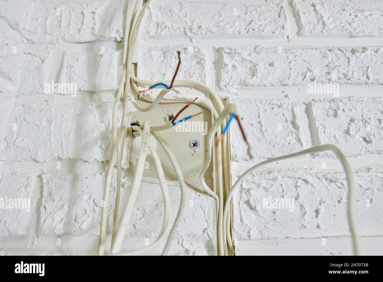 repair and replacement of electrical cables in the house Stock Photo ...