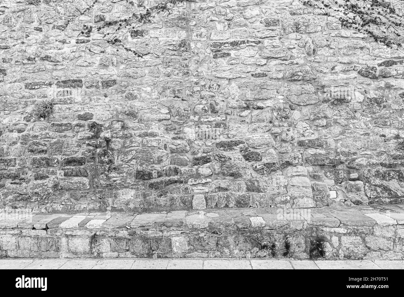Black and white texture of an old antique stone wall Stock Photo - Alamy