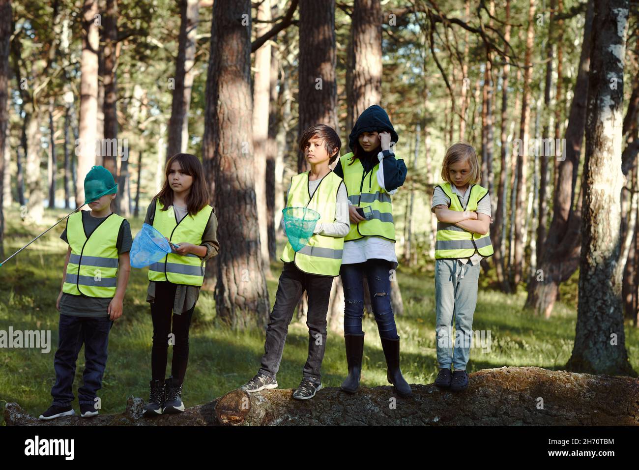 Boy and girl standing in forest hi-res stock photography and images - Alamy