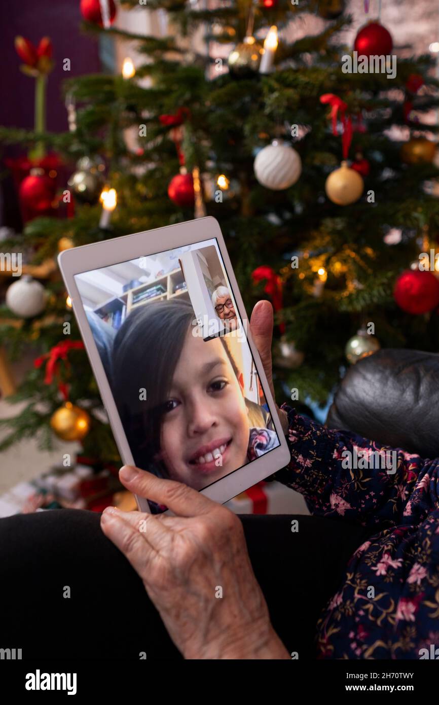 Mature woman video call grandchild hi-res stock photography and images ...