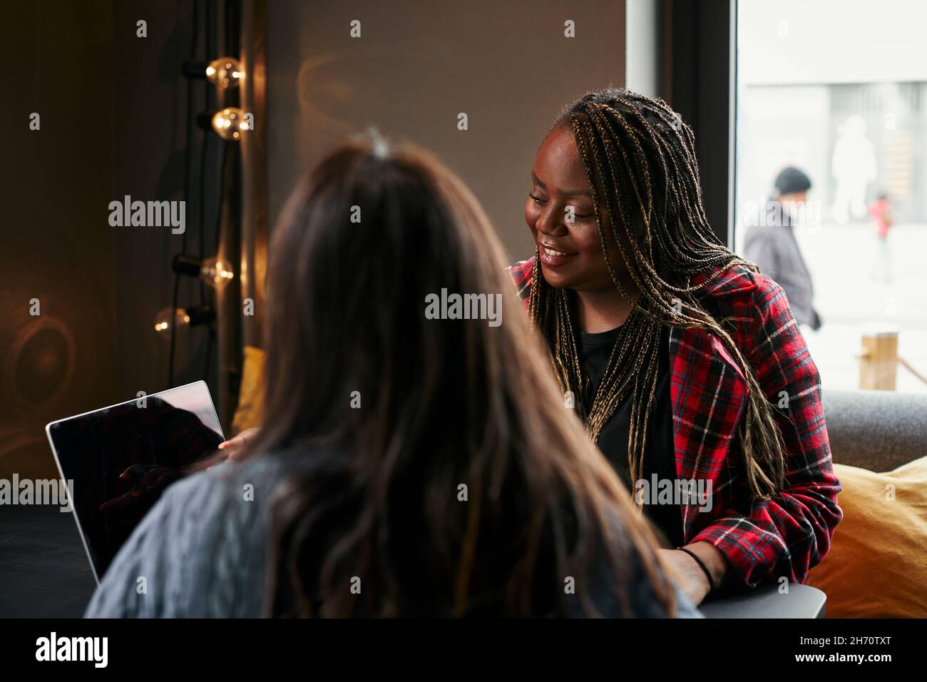 Coworkers talking during break Stock Photo - Alamy