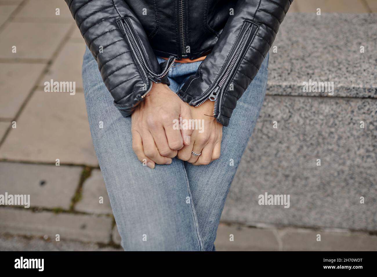 Close-up of female hands on thighs Stock Photo - Alamy