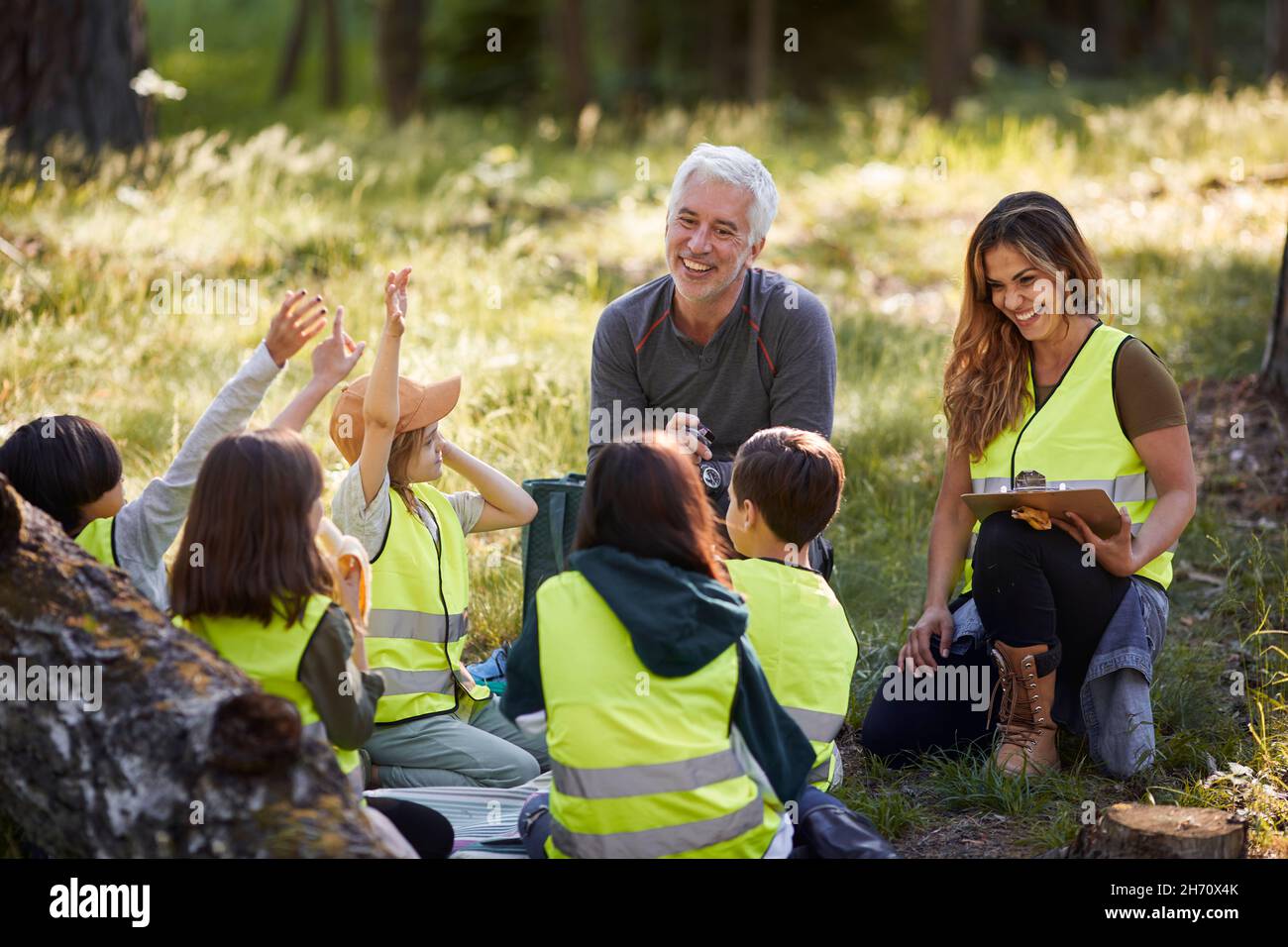 Teacher having classes outdoors Stock Photo - Alamy