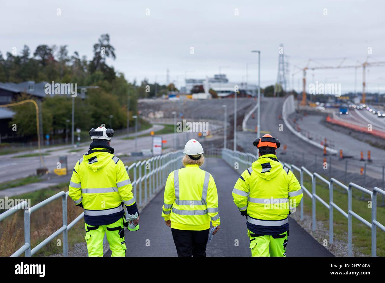 Construction worker walking hi-res stock photography and images - Alamy