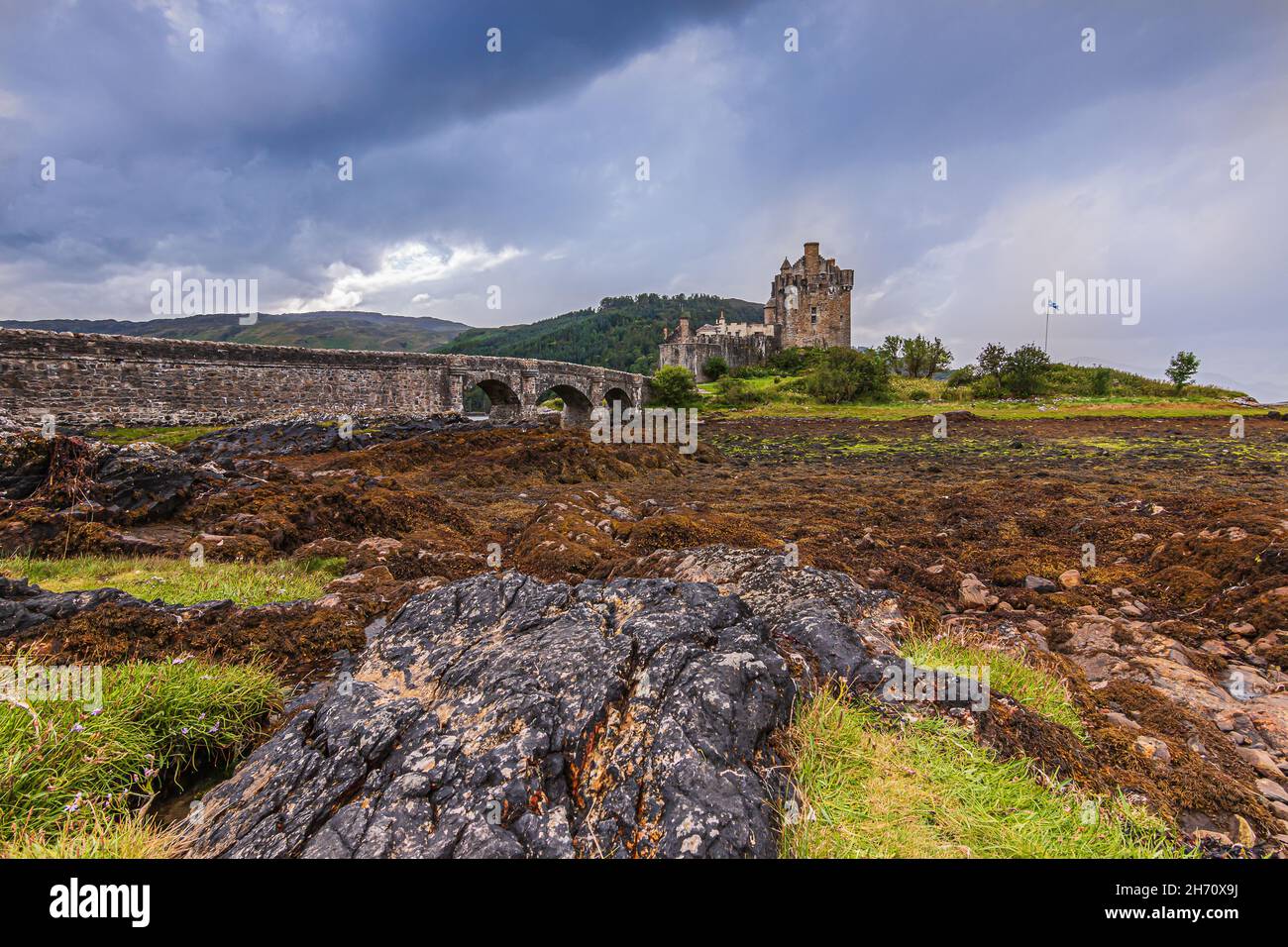 Historic castle in Scotland. Eilean Donan Castle on an island at low ...