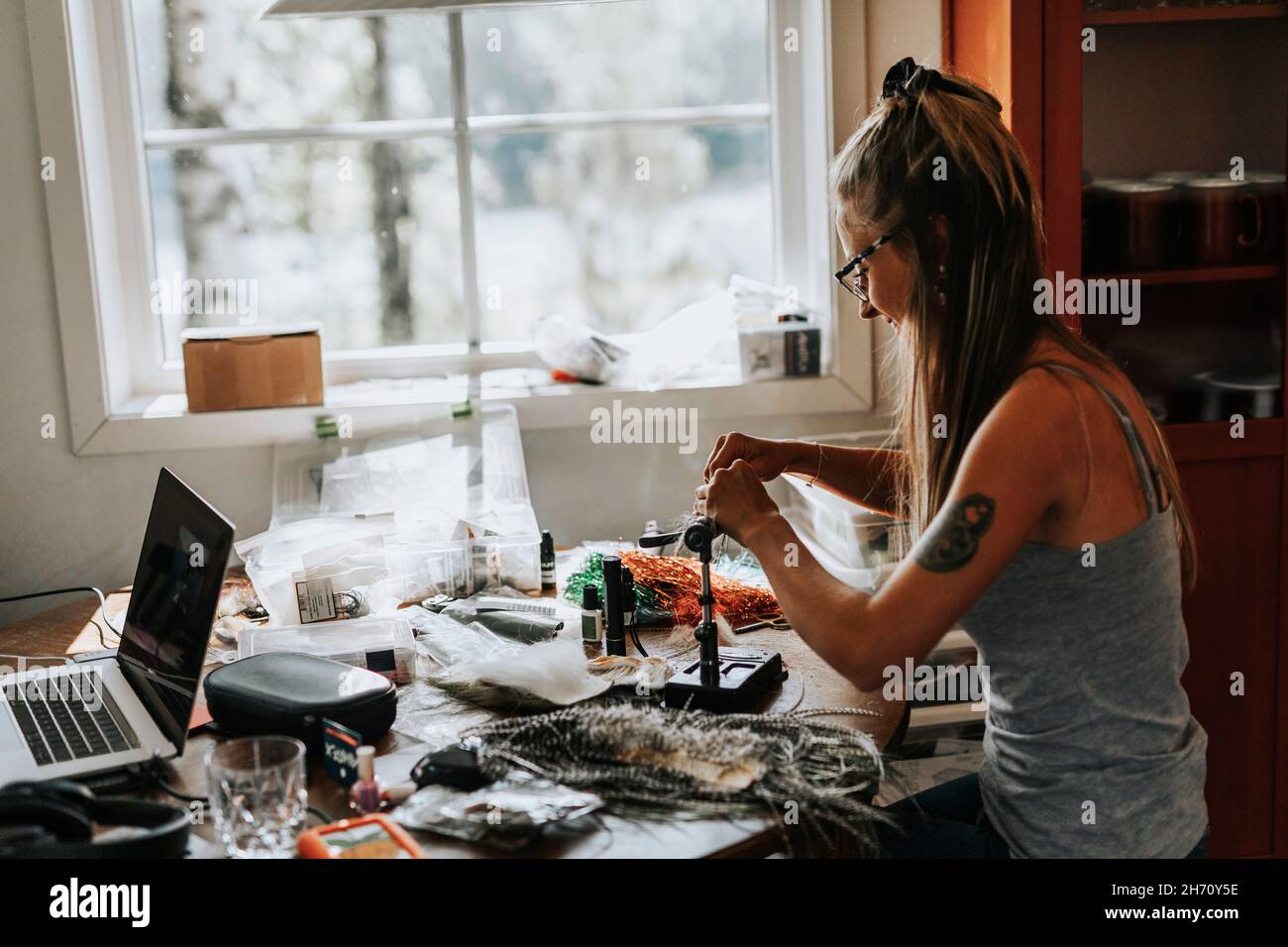Woman doing craft at home Stock Photo - Alamy