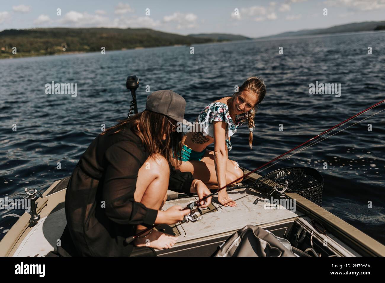 Women fishing hi-res stock photography and images - Alamy