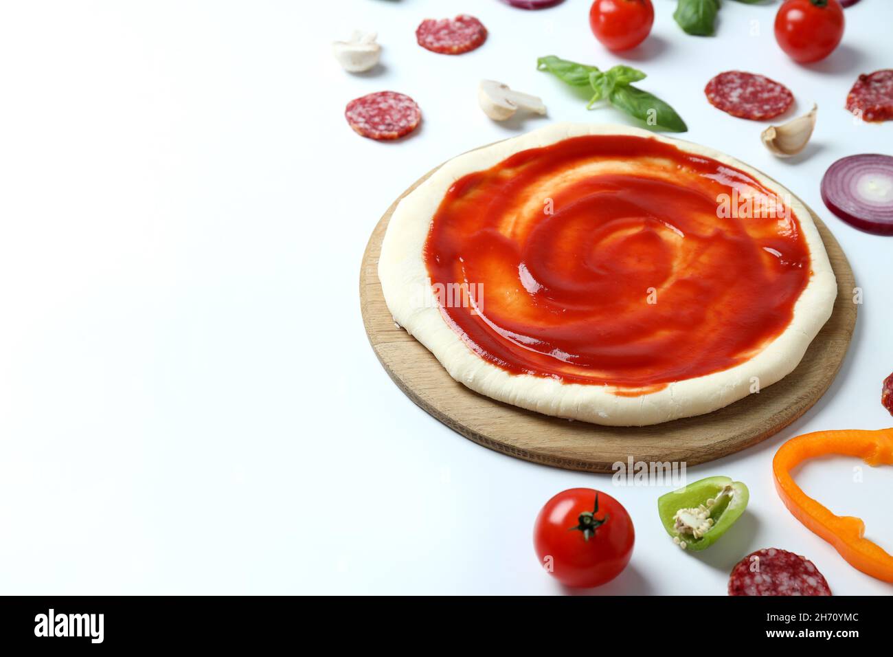 Concept of cooking pizza on white background Stock Photo - Alamy