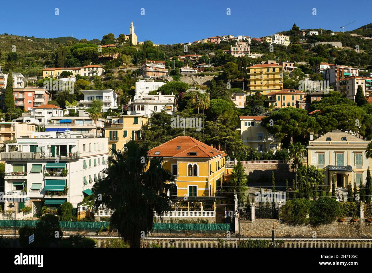 View of the hill overlooking the coastal town of Alassio with old ...