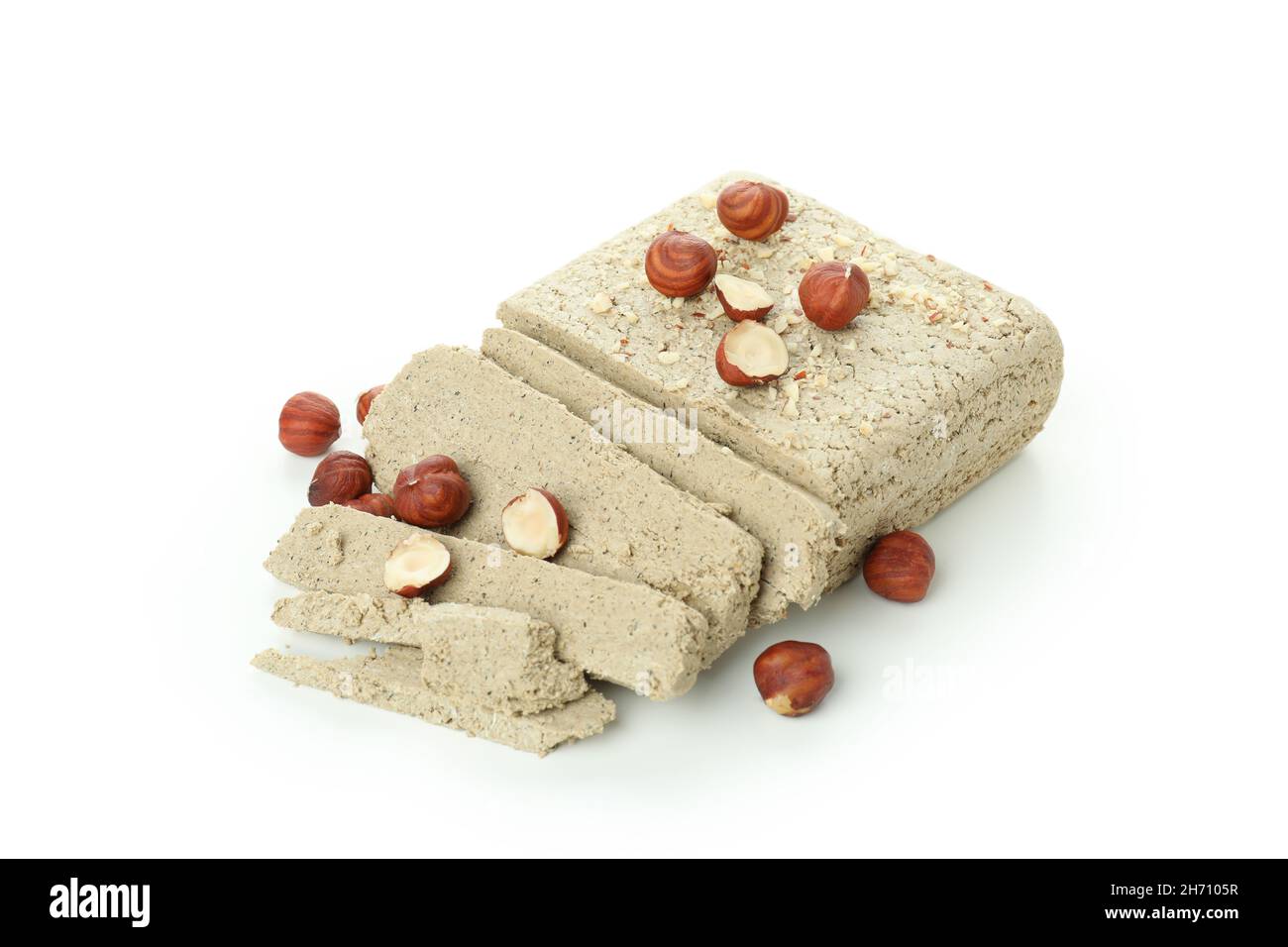 Halva with nuts isolated on white background Stock Photo - Alamy