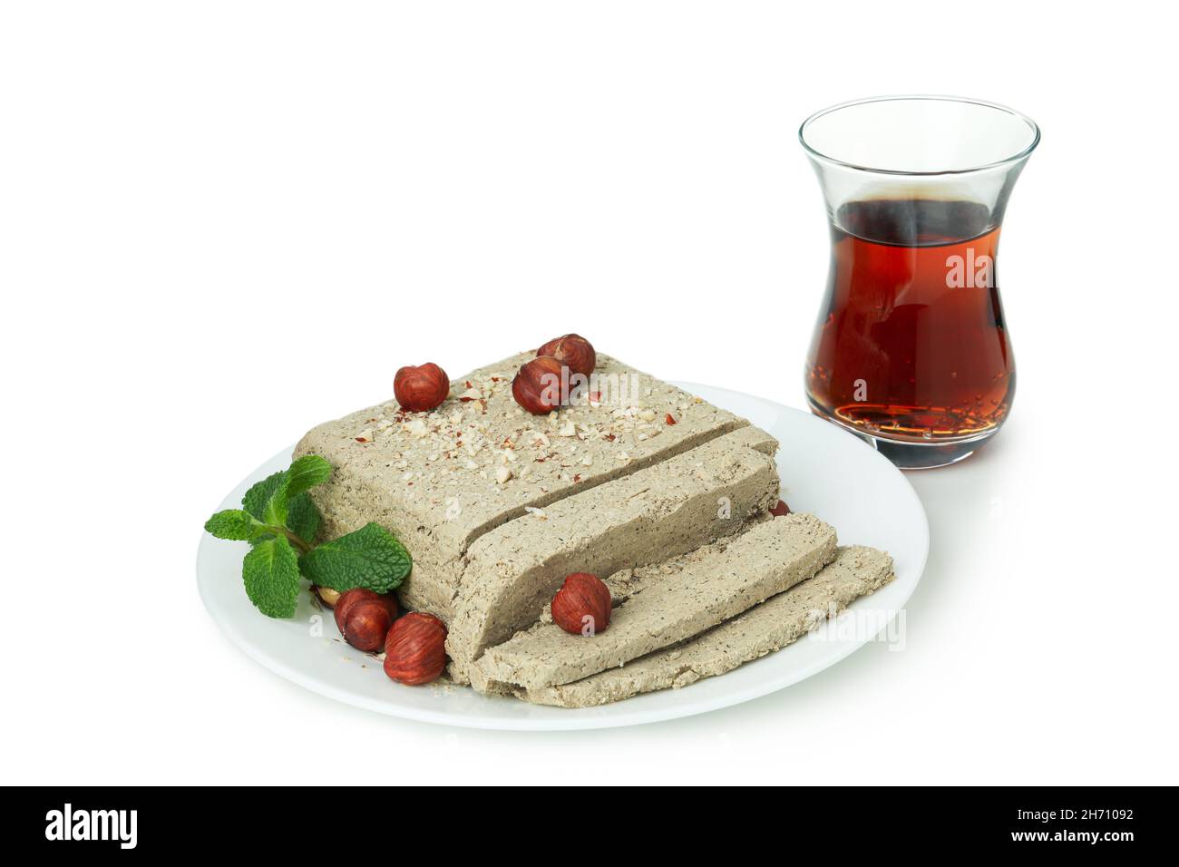 Concept of tasty food with halva isolated on white background Stock Photo - Alamy