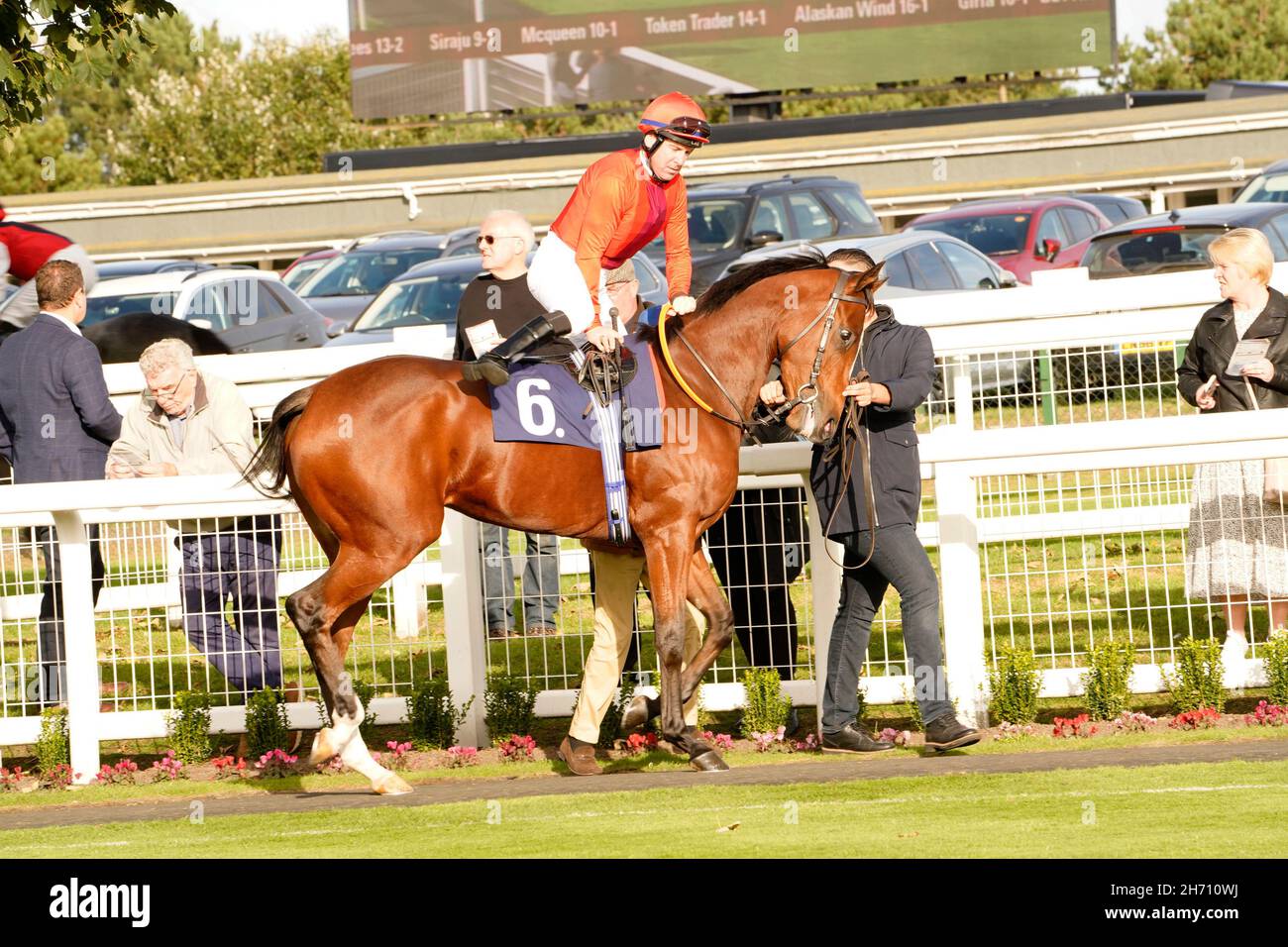 Documenting the atmosphere and thrill of a day at the races with the ...