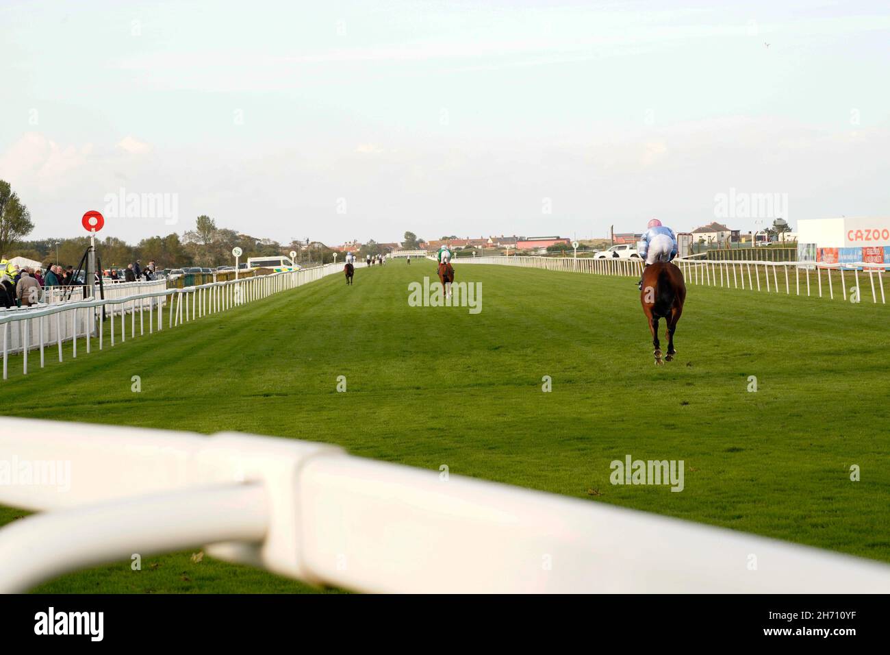 Documenting the atmosphere and thrill of a day at the races with the ...