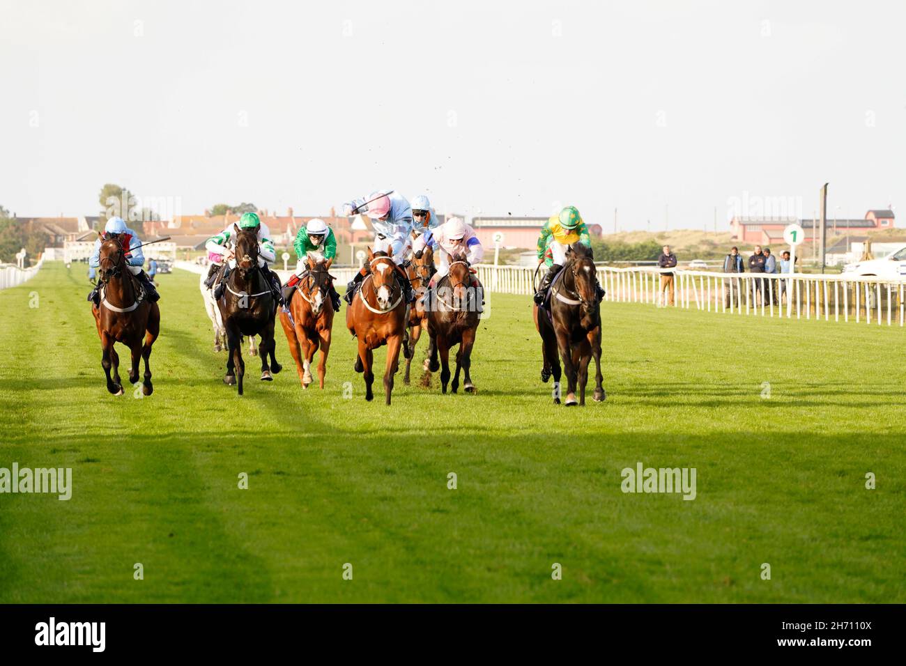 Documenting the atmosphere and thrill of a day at the races with the ...