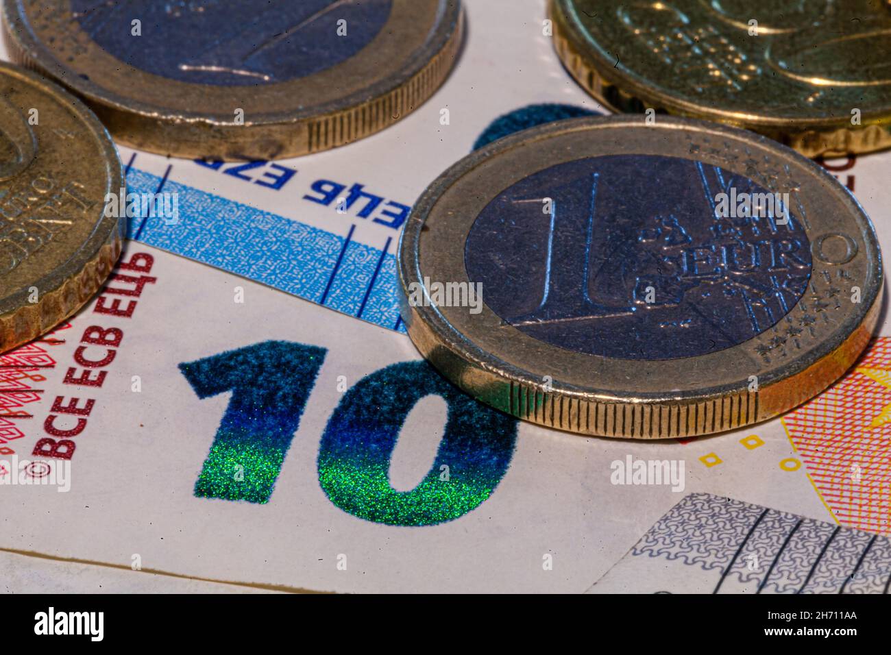 Euro money bank notes and coins Stock Photo - Alamy