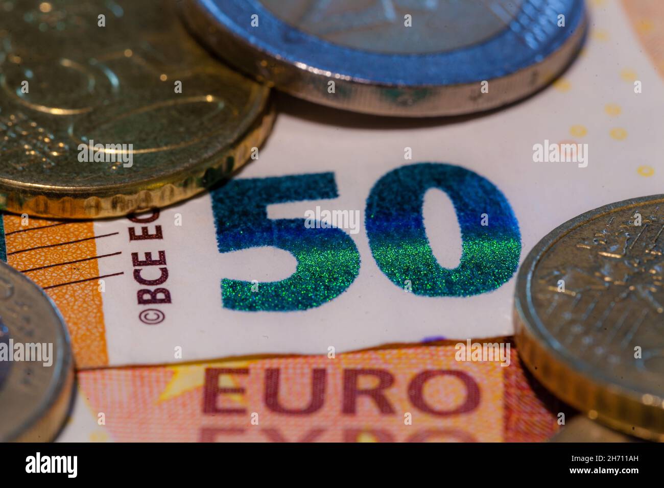Euro money bank notes and coins Stock Photo - Alamy