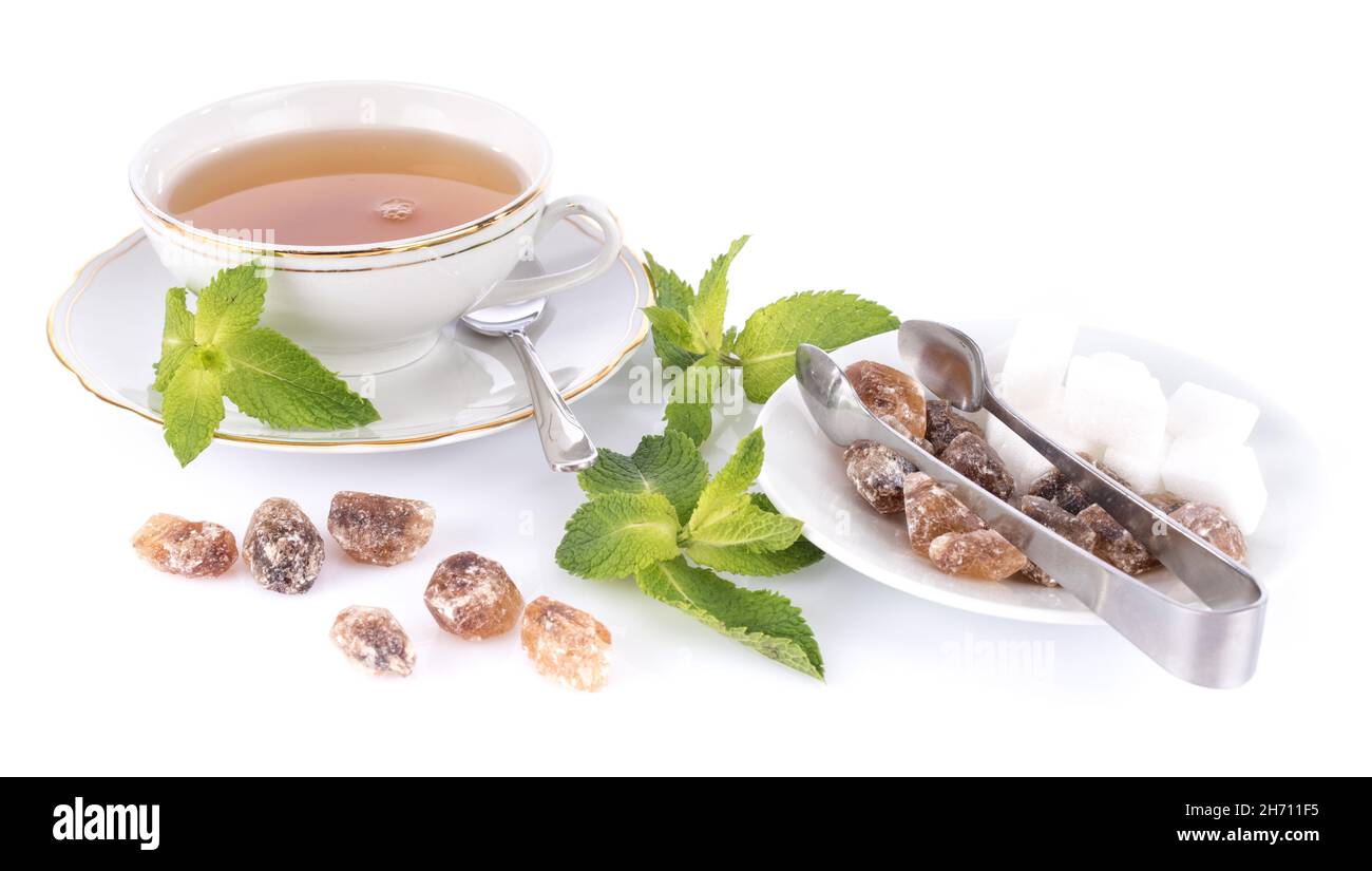 Cup of tea and sugar, isolated on white Stock Photo - Alamy
