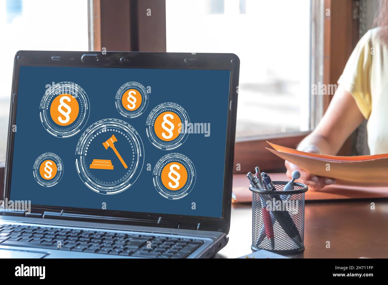 Laptop screen displaying a justice concept Stock Photo - Alamy