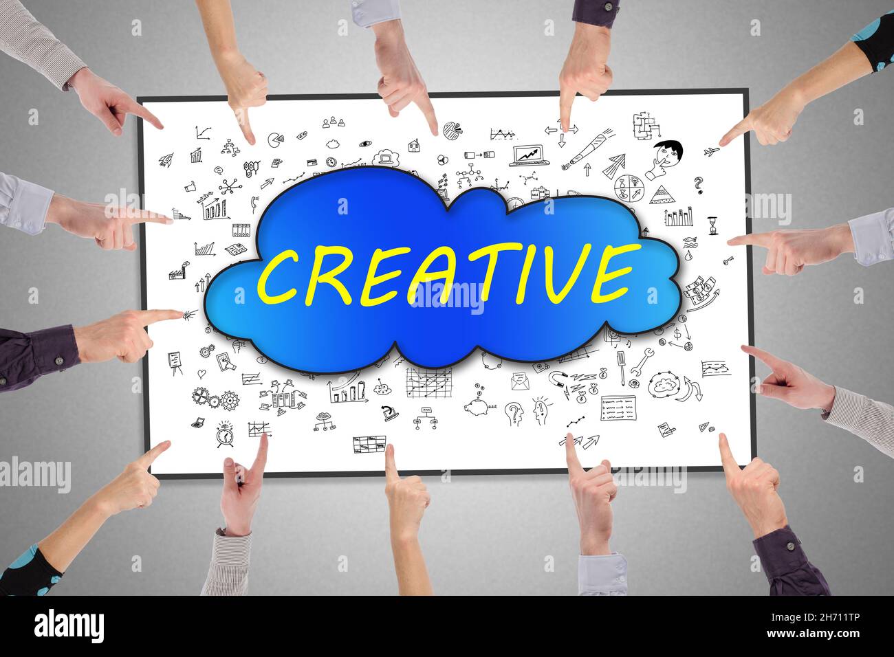 Hands pointing to creativity concept Stock Photo - Alamy