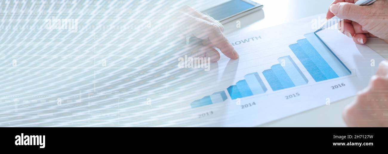 Analyzing growing results on a graphic. panoramic banner Stock Photo ...