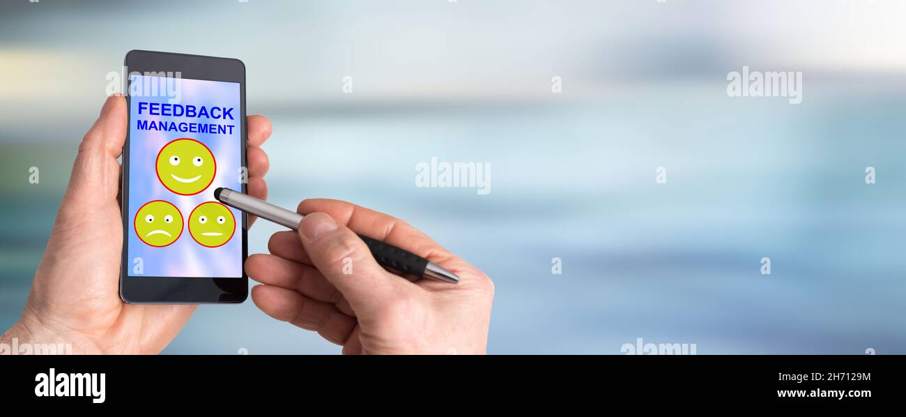 Smartphone screen displaying a feedback management concept Stock Photo ...