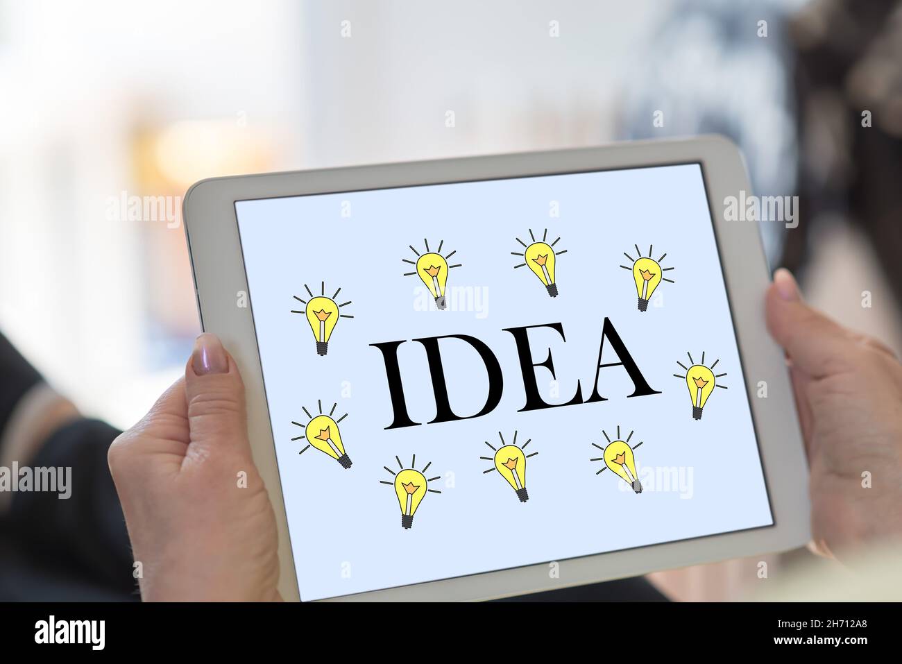 Tablet screen displaying an idea concept Stock Photo - Alamy