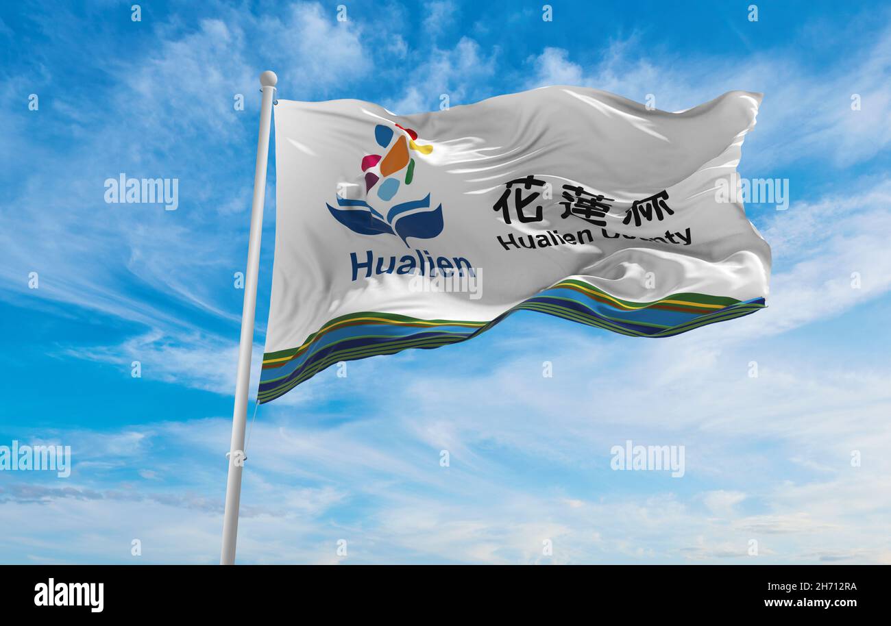 flag of Hualien, County at cloudy sky background on sunset, panoramic ...