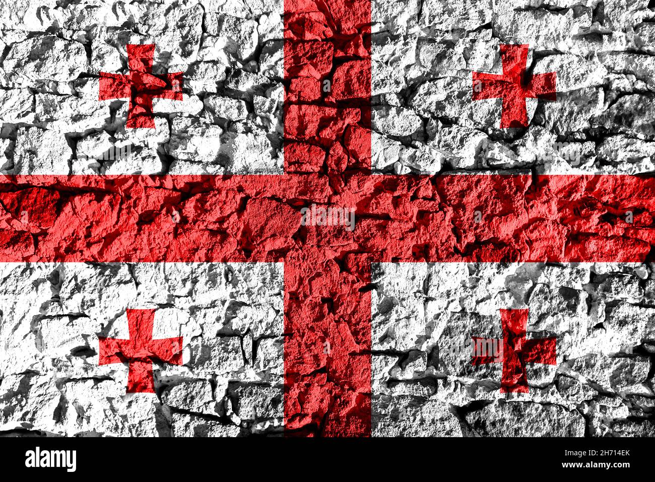 Georgia flag depicted on a stone wall. The texture of the stone blends ...