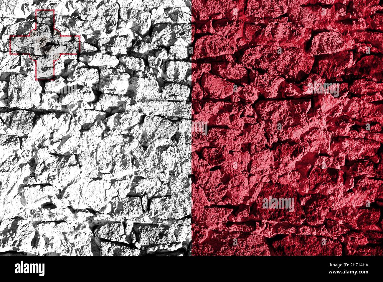 Malta flag depicted on a stone wall. The texture of the stone blends ...