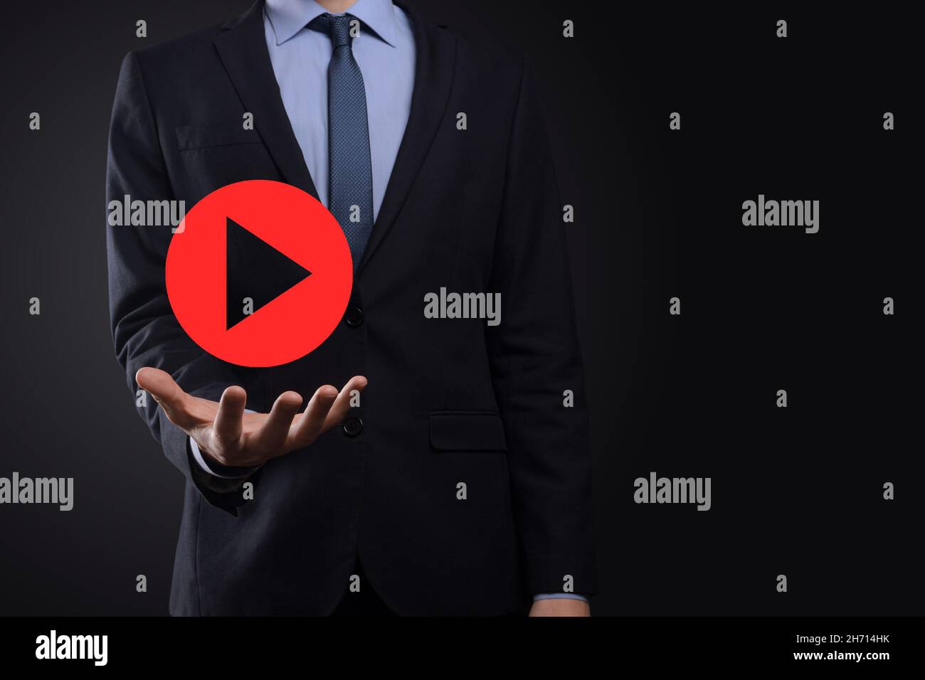 Businessman pressing, hold play button sign to start or initiate ...