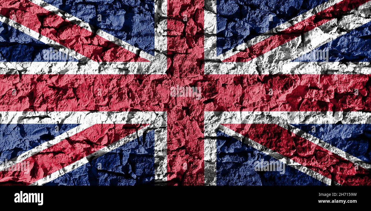 United Kingdom flag depicted on a stone wall. The texture of the stone ...