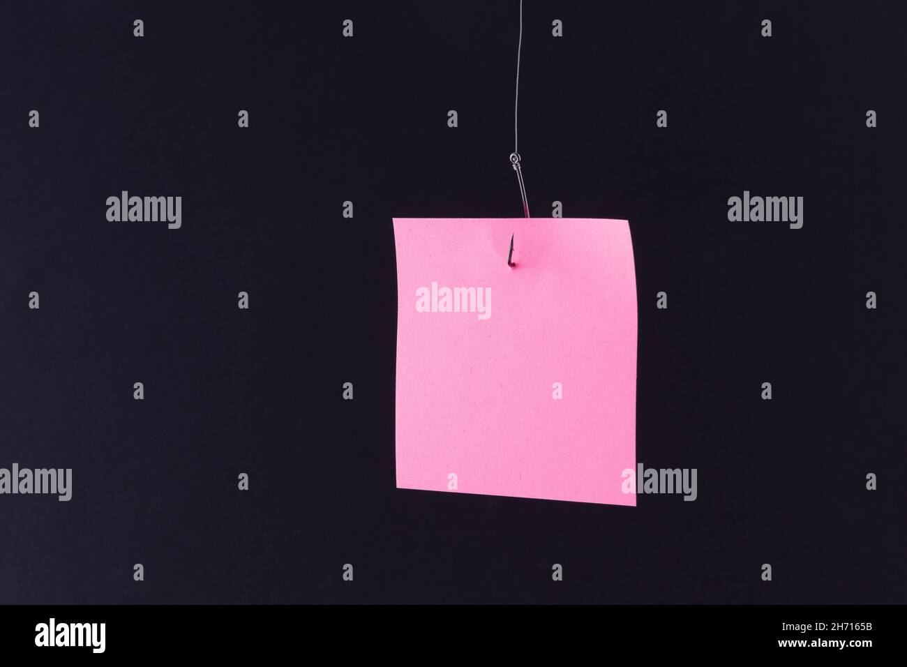 Mockup of a Blank Pink Memo Paper with Copy Space Hanging on a Fishing ...