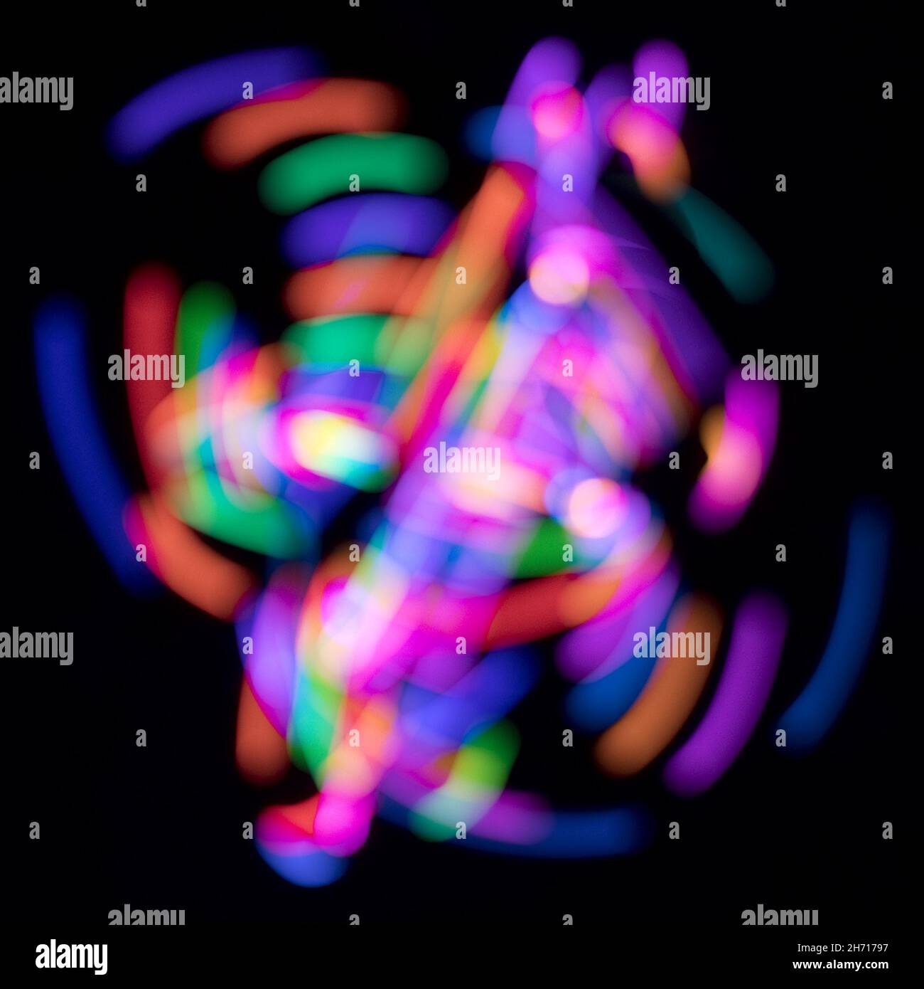 Abstract rainbow path of moving LED light on black backgroung Stock ...